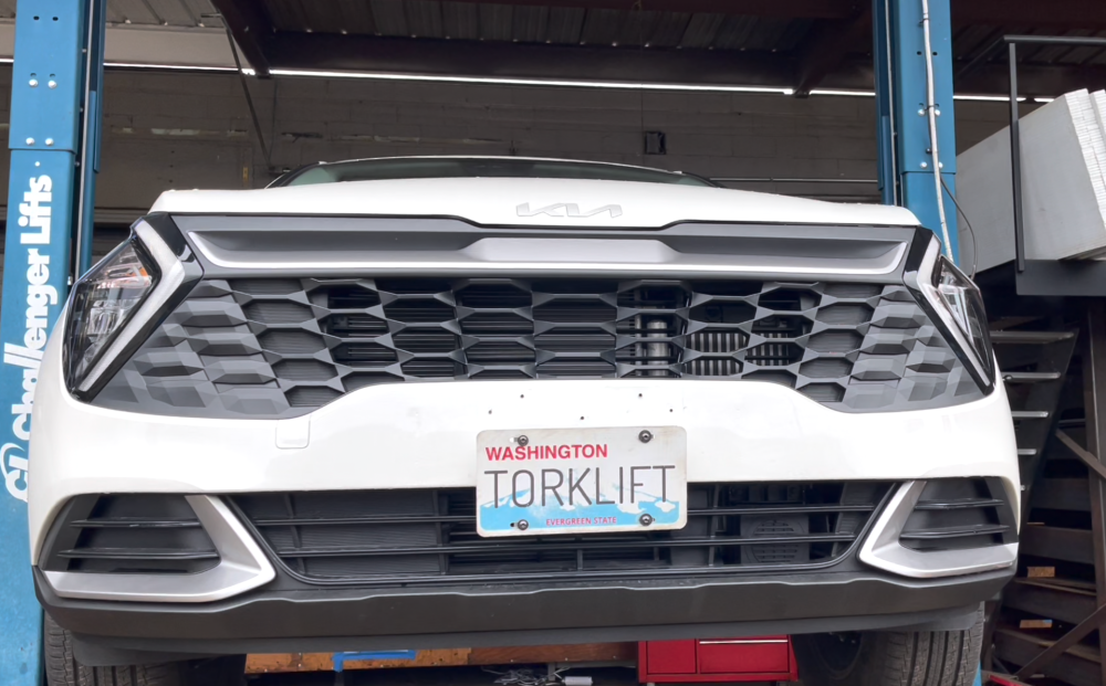 Torklift Central | The Law – Kia Sportage Hybrid HEV front license ...